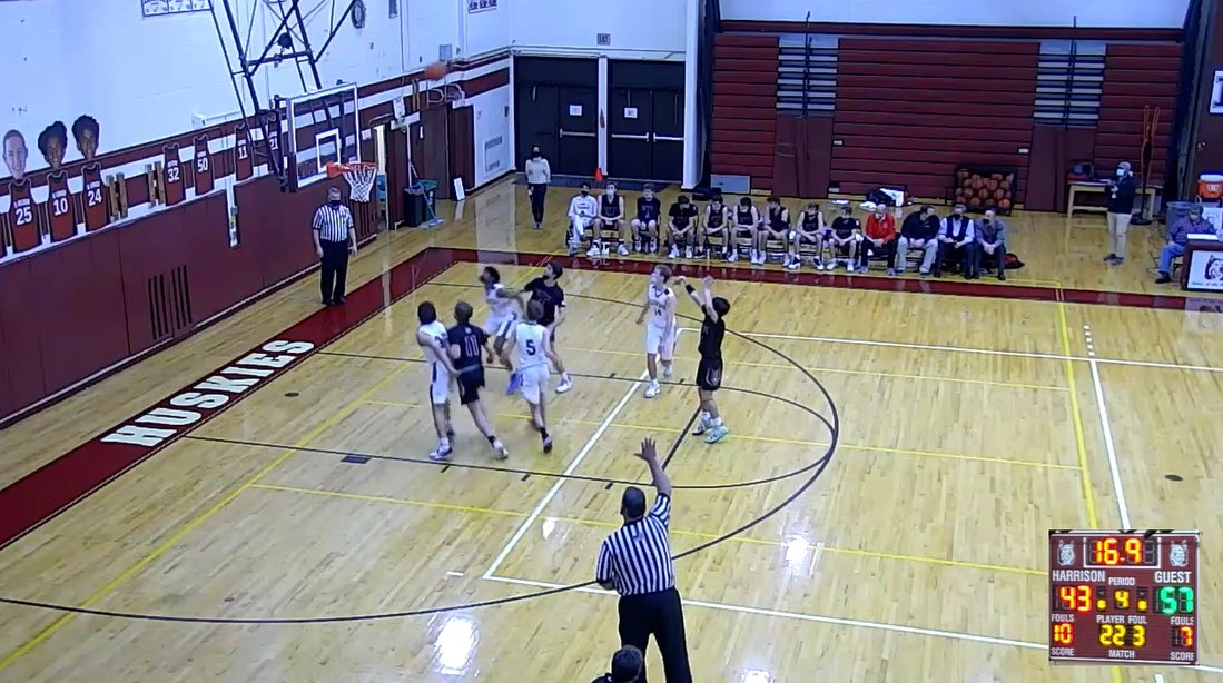 Boys Varsity Basketball Bites the Huskies - MyRye.com